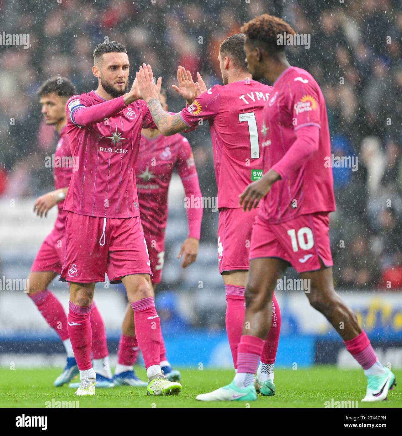 Matt Grimes 8# of Swansea City Association Football Club and Josh Tymon ...