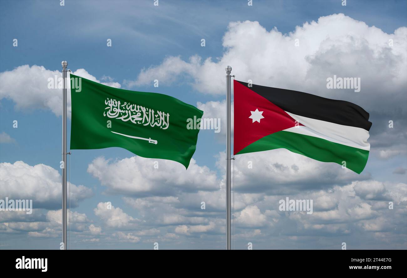 Jordan and Saudi Arabia flags waving together in the wind on blue ...