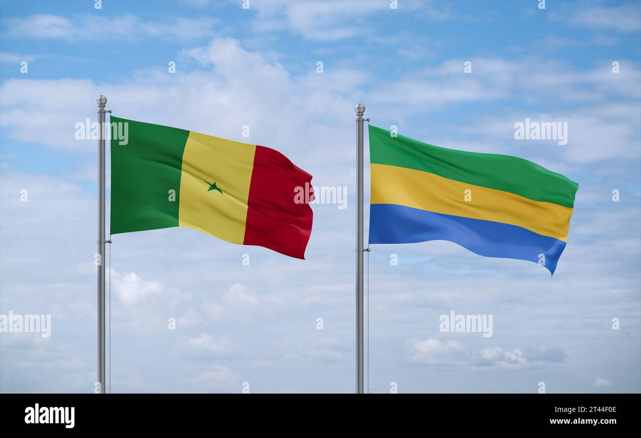 Gabon and Senegal flags waving together on blue cloudy sky, two country ...