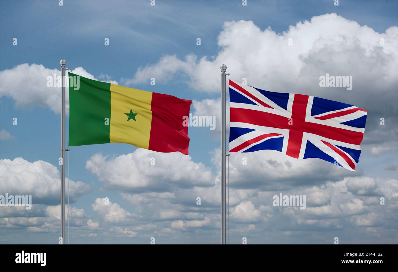 United Kingdom and Senegal flags waving together in the wind on blue ...