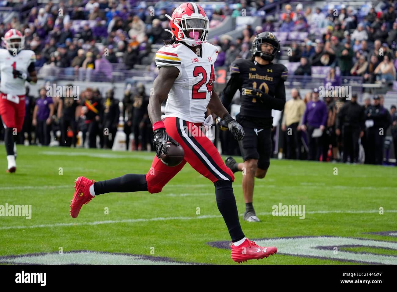 Maryland running back Roman Hemby scores a touchdown during the first ...
