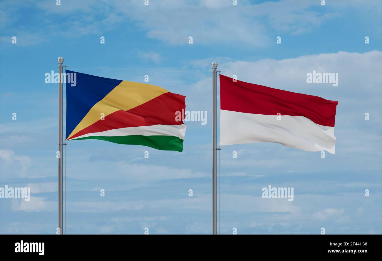 Indonesia and Seychelles flags waving together on blue cloudy sky, two country relationship ...