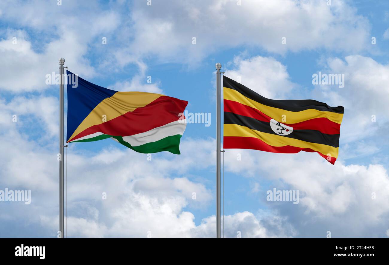 Republic of Uganda and Seychelles flags waving together in the wind on ...
