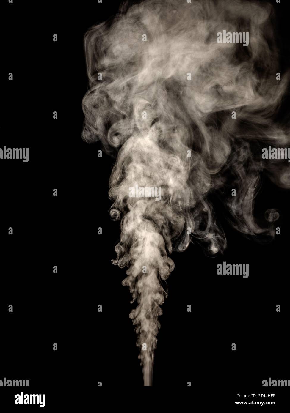 Thick white smoke isolated on a black background, rising tubers upwards ...
