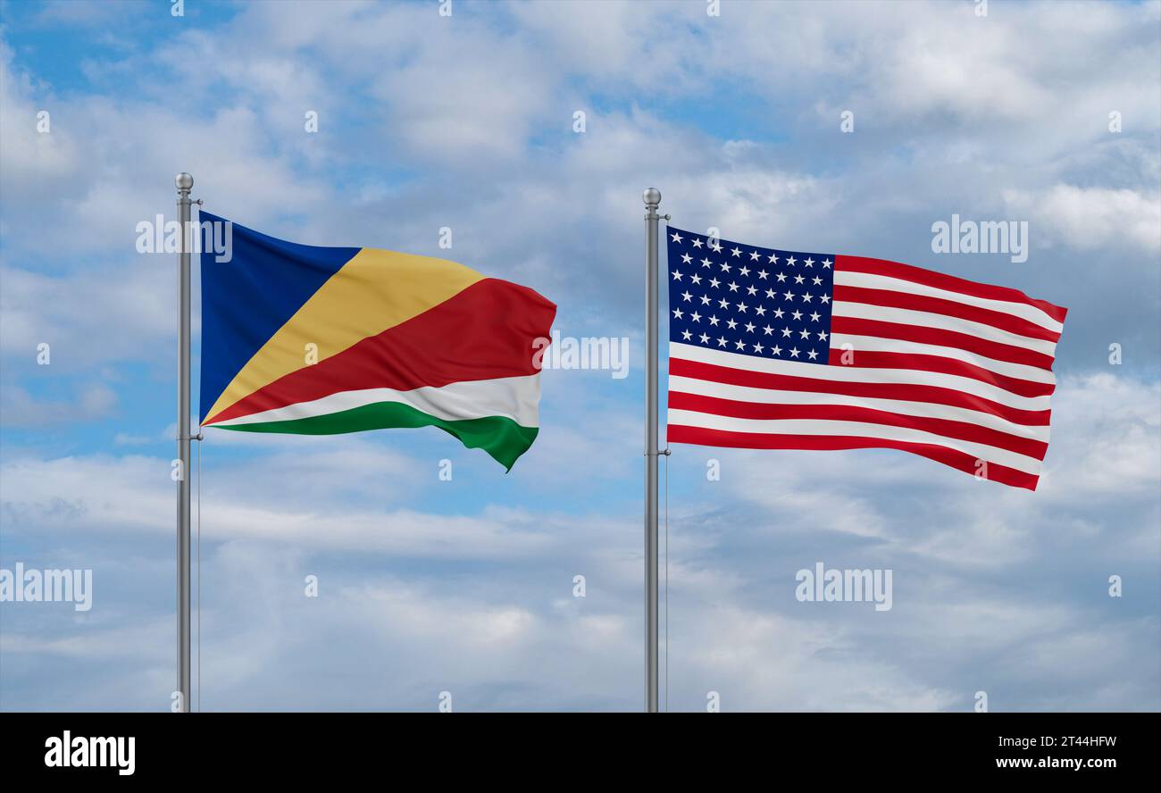USA and Seychelles flags waving together in the wind on blue cloudy sky, two country ...