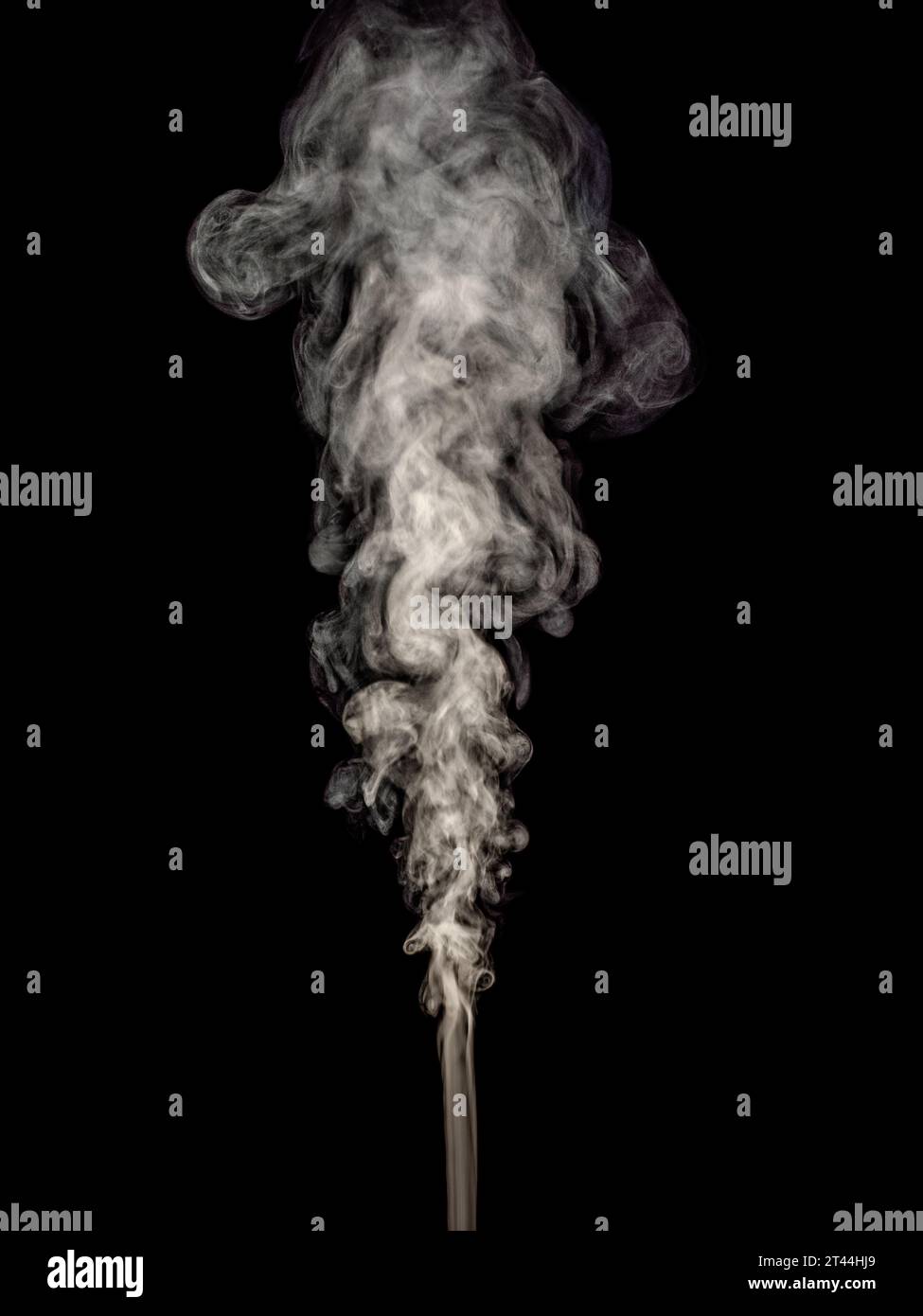 Fluffy wisp of white smoke isolated on black background and rising up ...