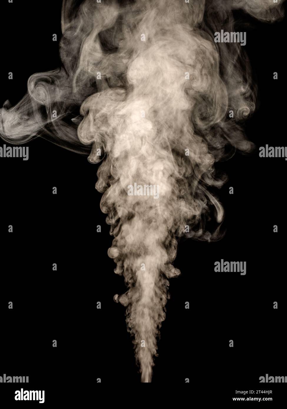 A stream of white smoke swirls isolated on black background and rises ...