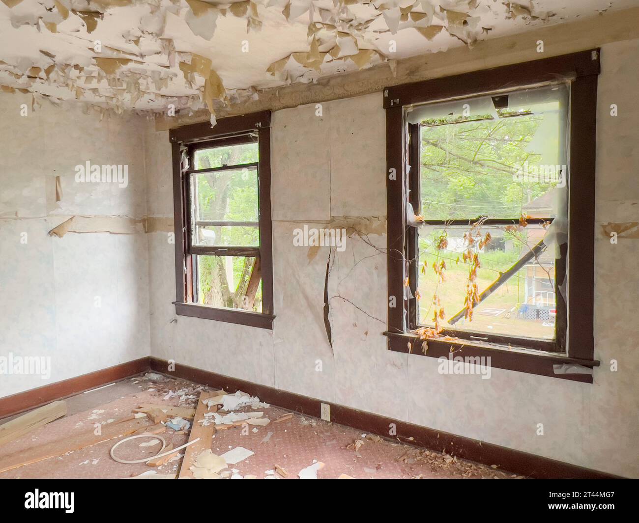 abandoned, broken windows of abandoned house interior with pealed ...
