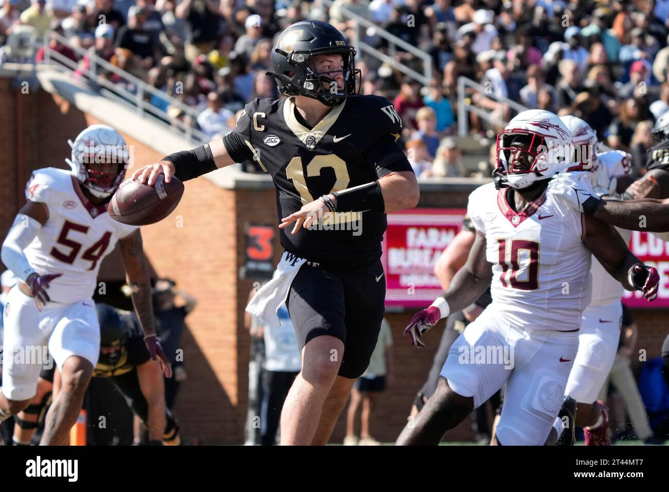 Wake Forest quarterback Mitch Griffis (12) looks to pass against ...