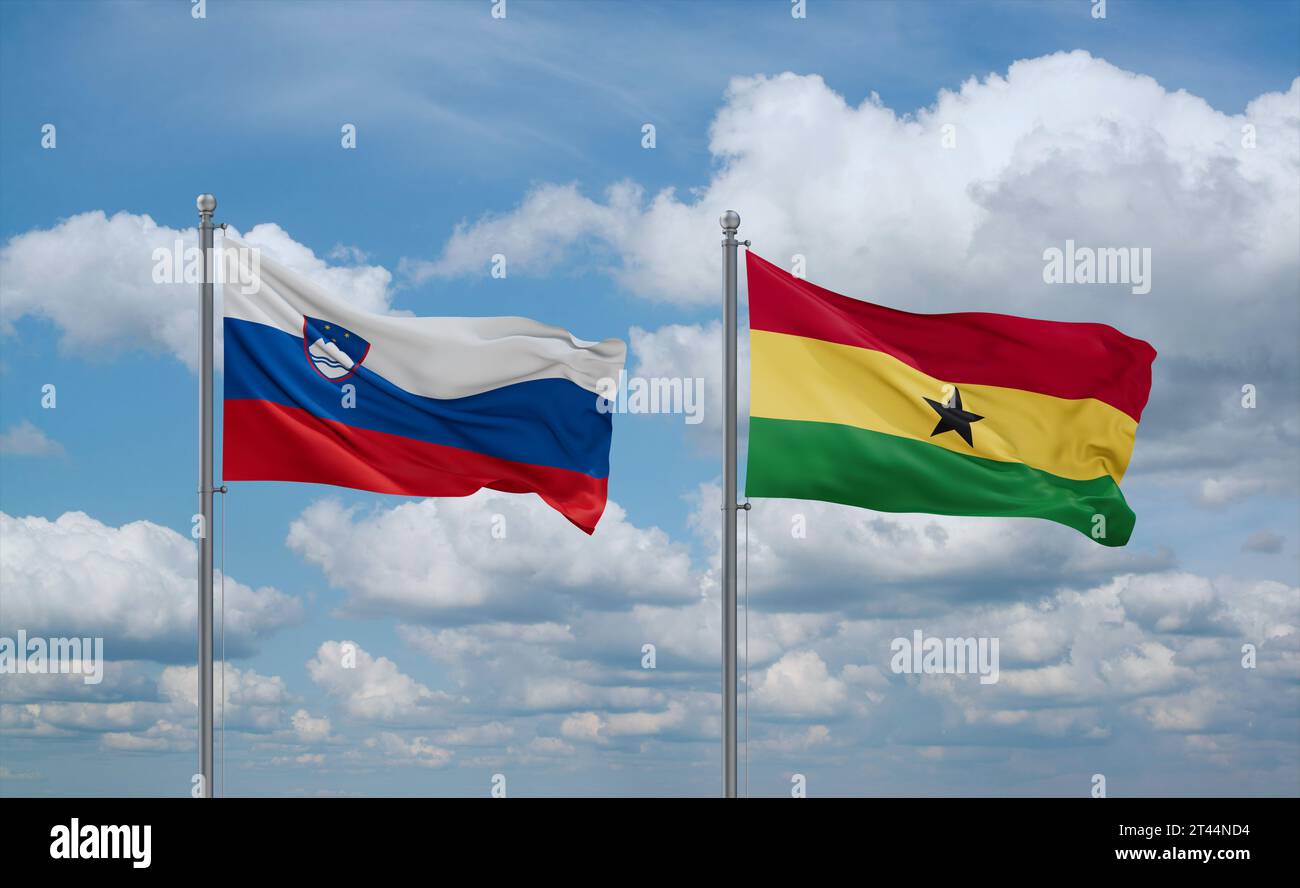 Ghana and Slovenia flags waving together on blue cloudy sky, two ...