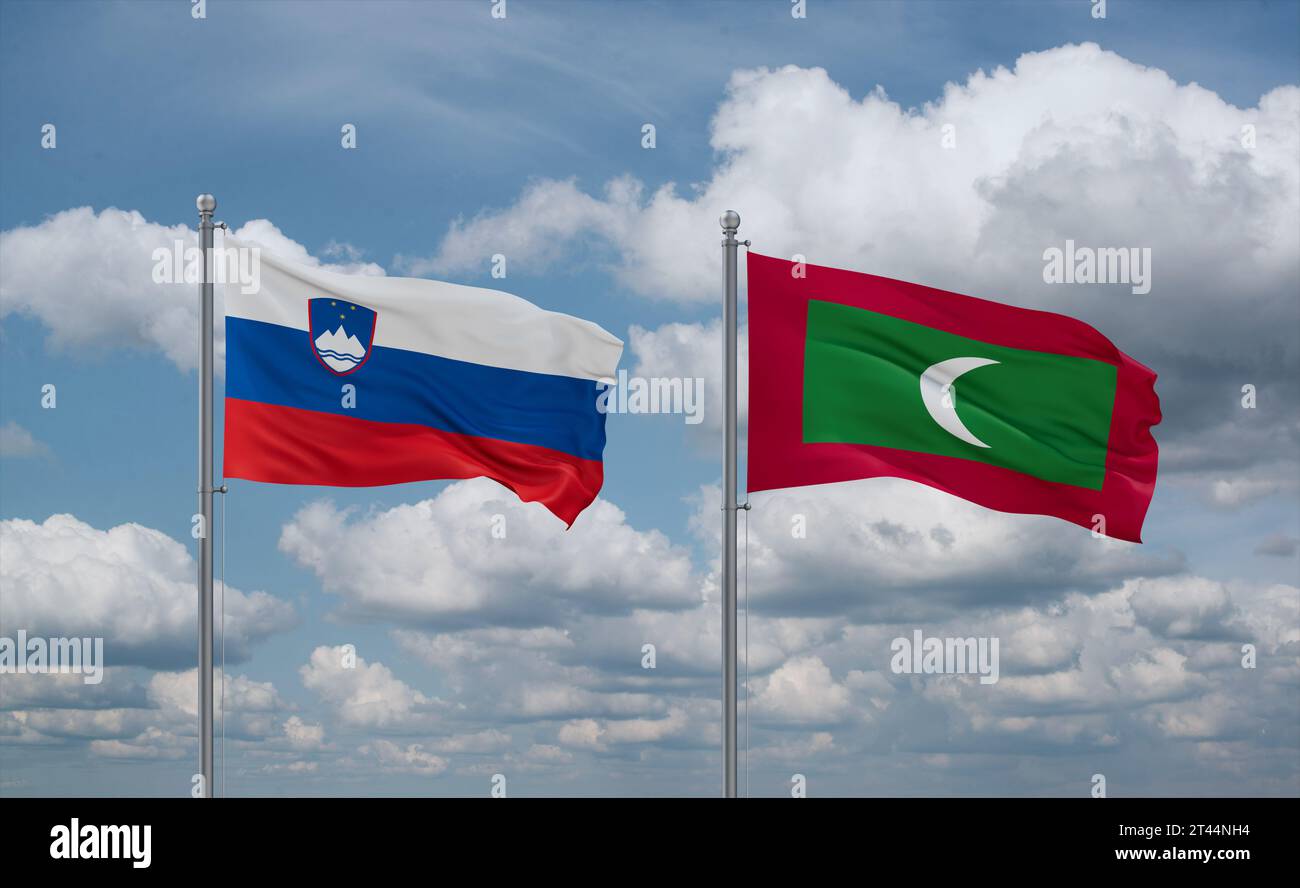 Maldives and Slovenia flags waving together on blue cloudy sky, two country relationship concept ...