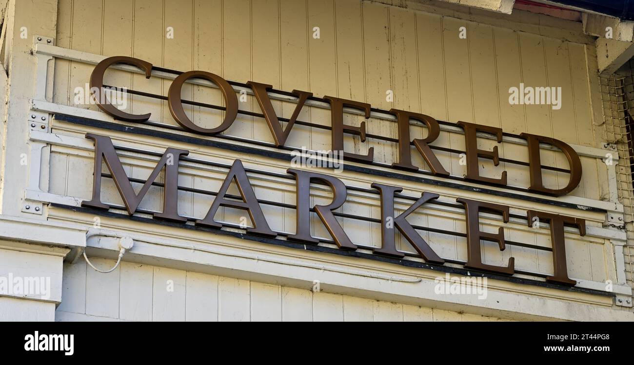 Signboard “Covered Market” on wood panelling at Oxford indoor market ...