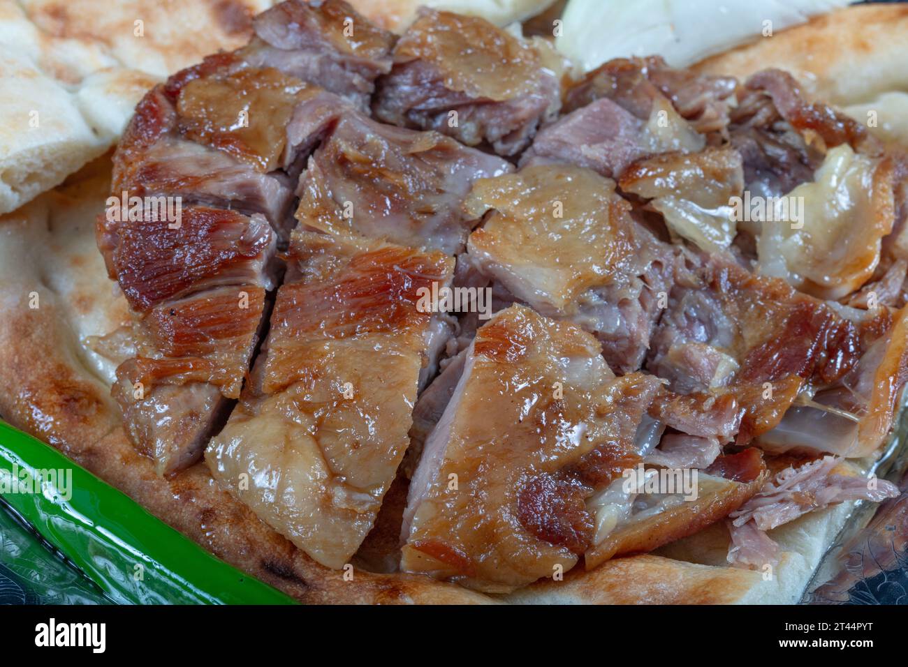 Turkish cuisine lamb ribs on pita bread. Tandoori style lamb chops and ...