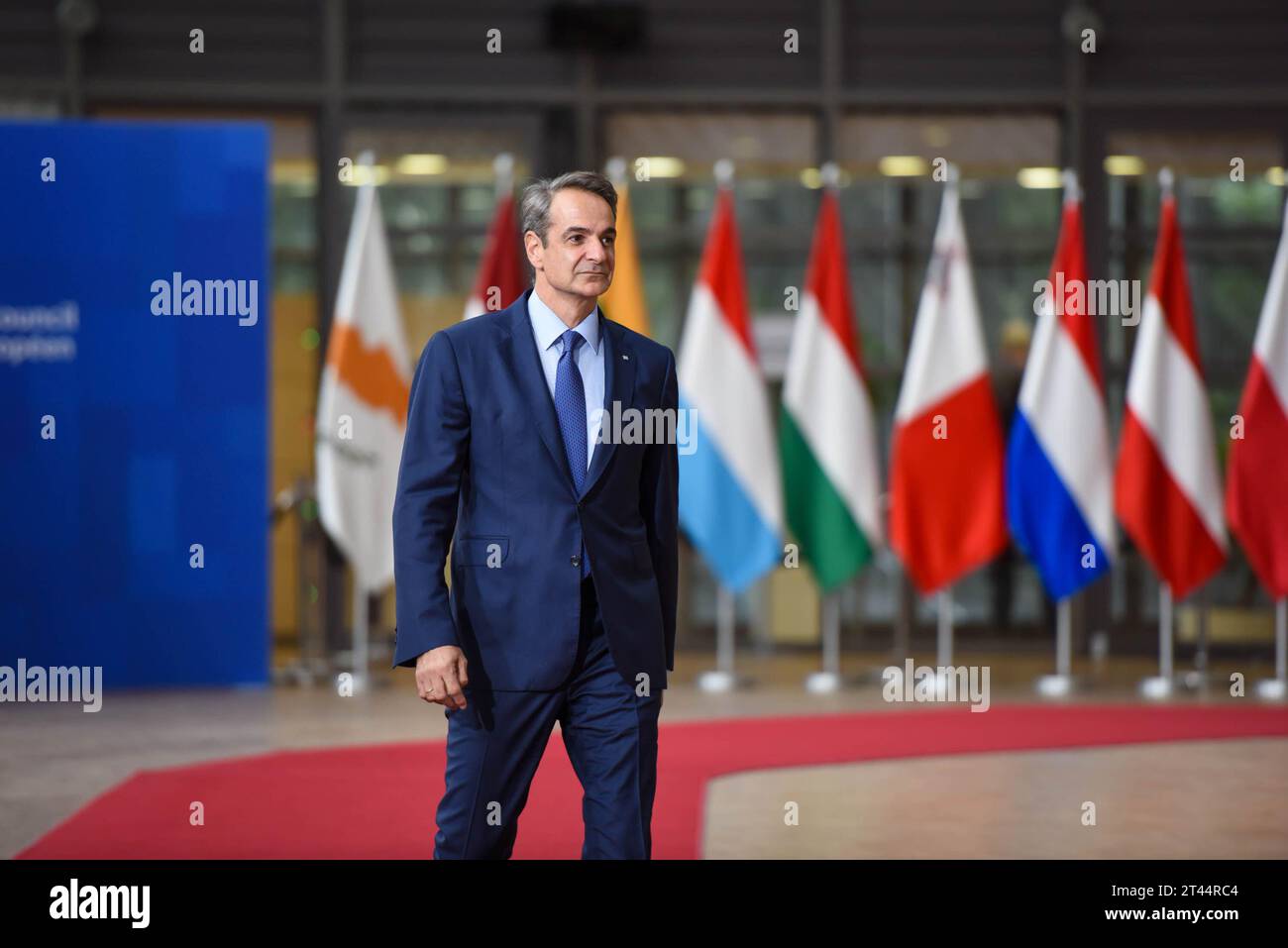 Greece's Prime Minister Kyriakos Mitsotakis arrives for an EU summit at ...