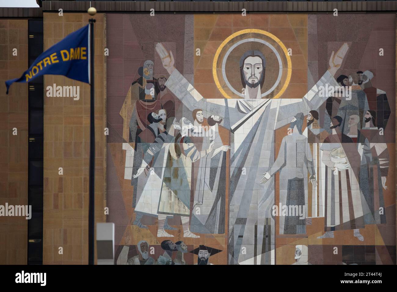 A Notre Dame flag flies near the "Touchdown Jesus" mural on the ...