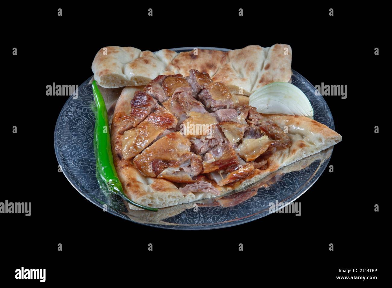 Turkish cuisine lamb ribs on pita bread. Tandoori style lamb chops and ...