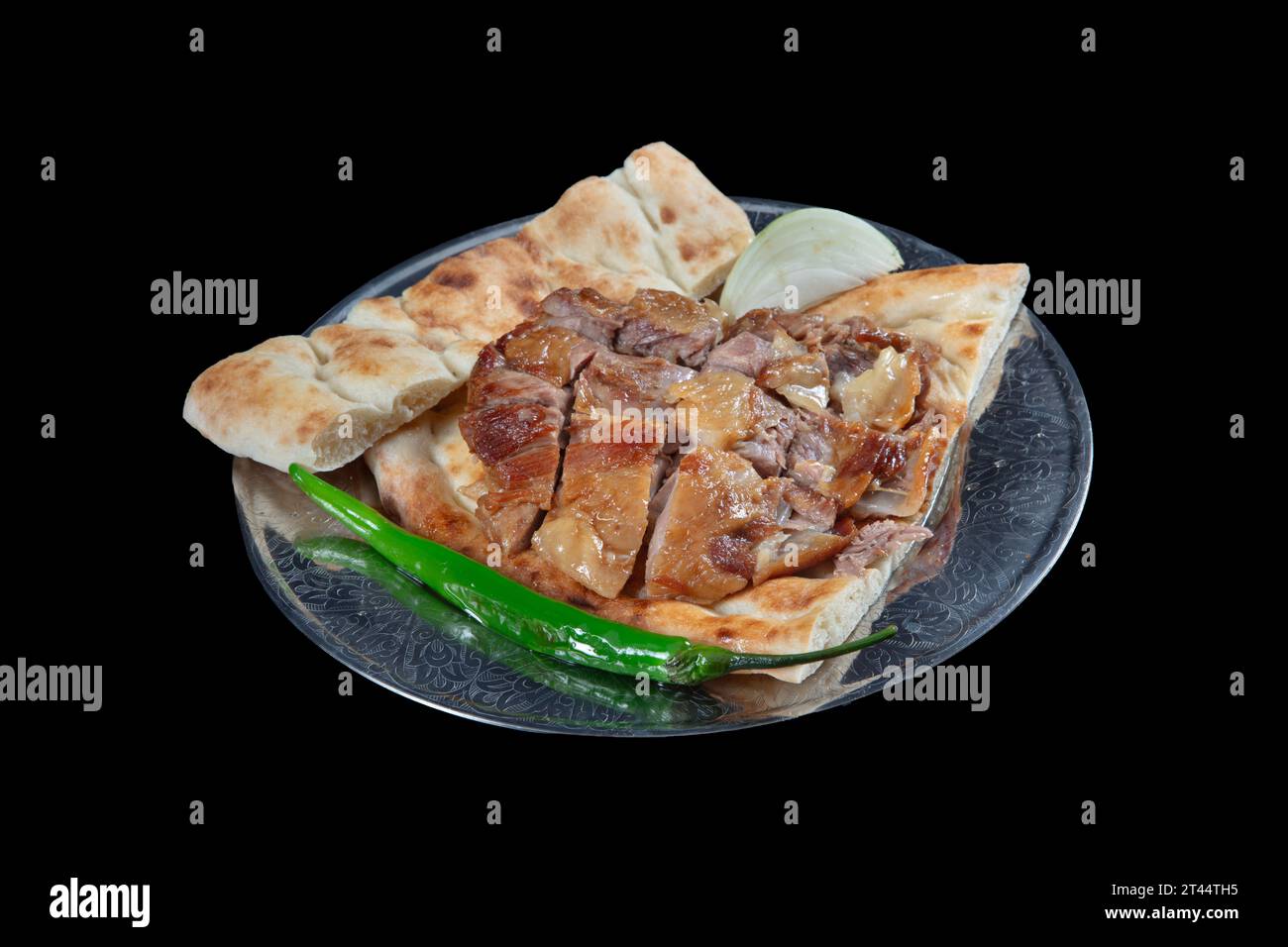 Turkish cuisine lamb ribs on pita bread. Tandoori style lamb chops and ...