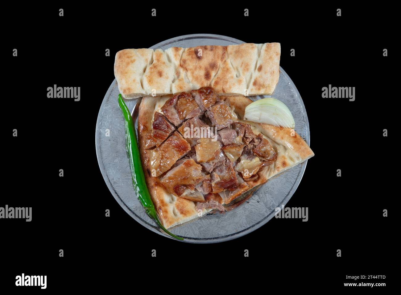 Turkish cuisine lamb ribs on pita bread. Tandoori style lamb chops and ...
