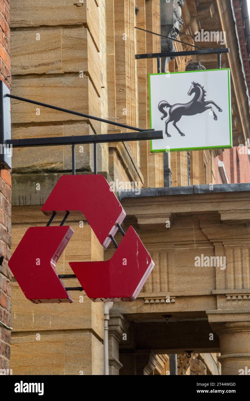 high street banks signs on a wall of old buildings in the city centre ...