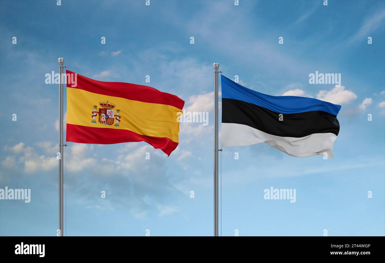 Estonia and Spain flags waving together on blue cloudy sky, two country ...