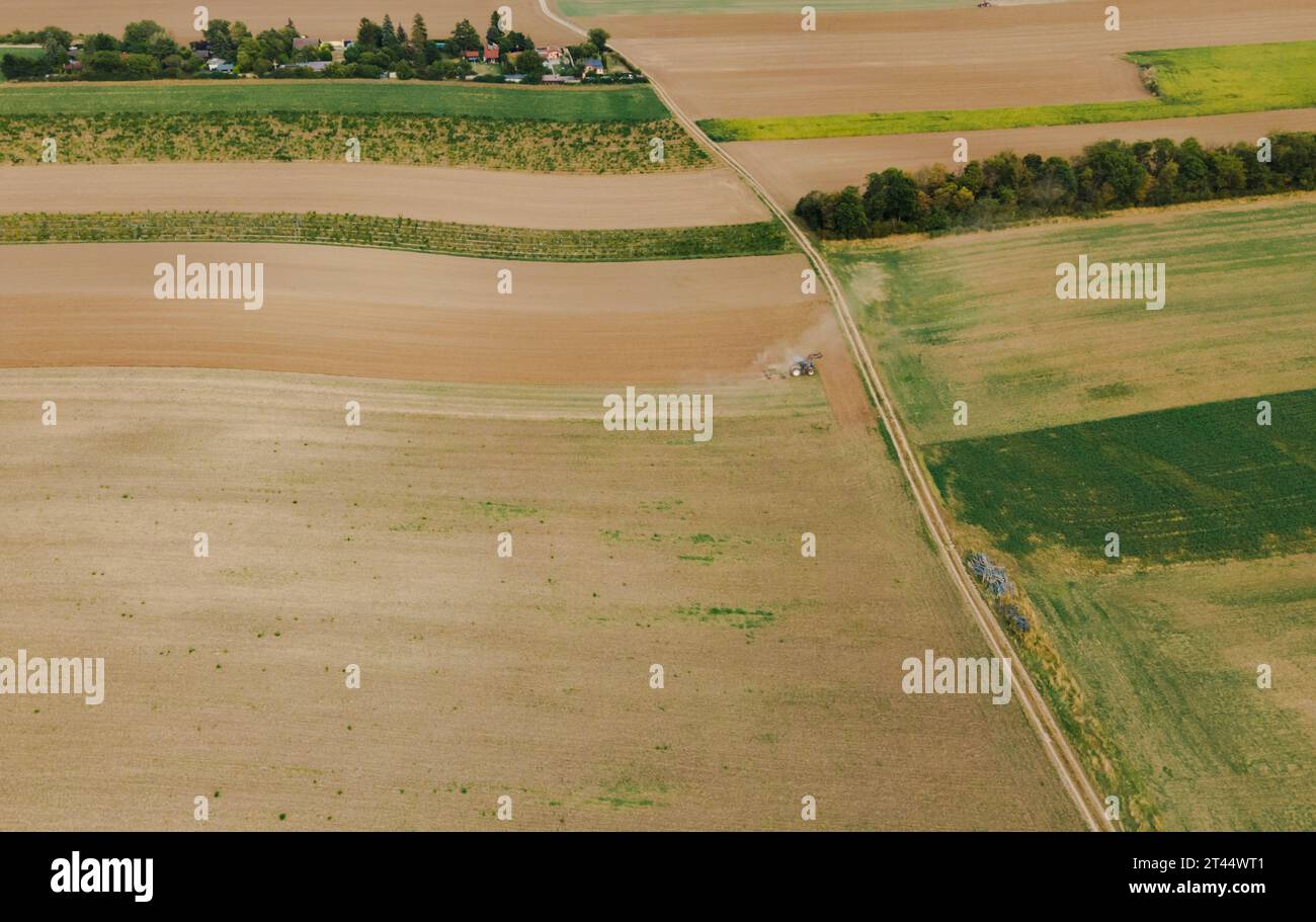 Drone view down on agriculture crop land with wheat fields Vineyards ...