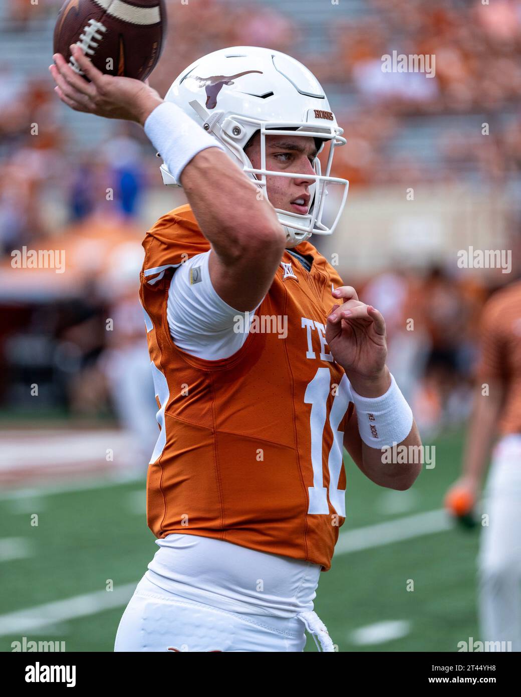 Oct 28, 2023. Arch Manning #16 of the Texas Longhorns warming up before ...