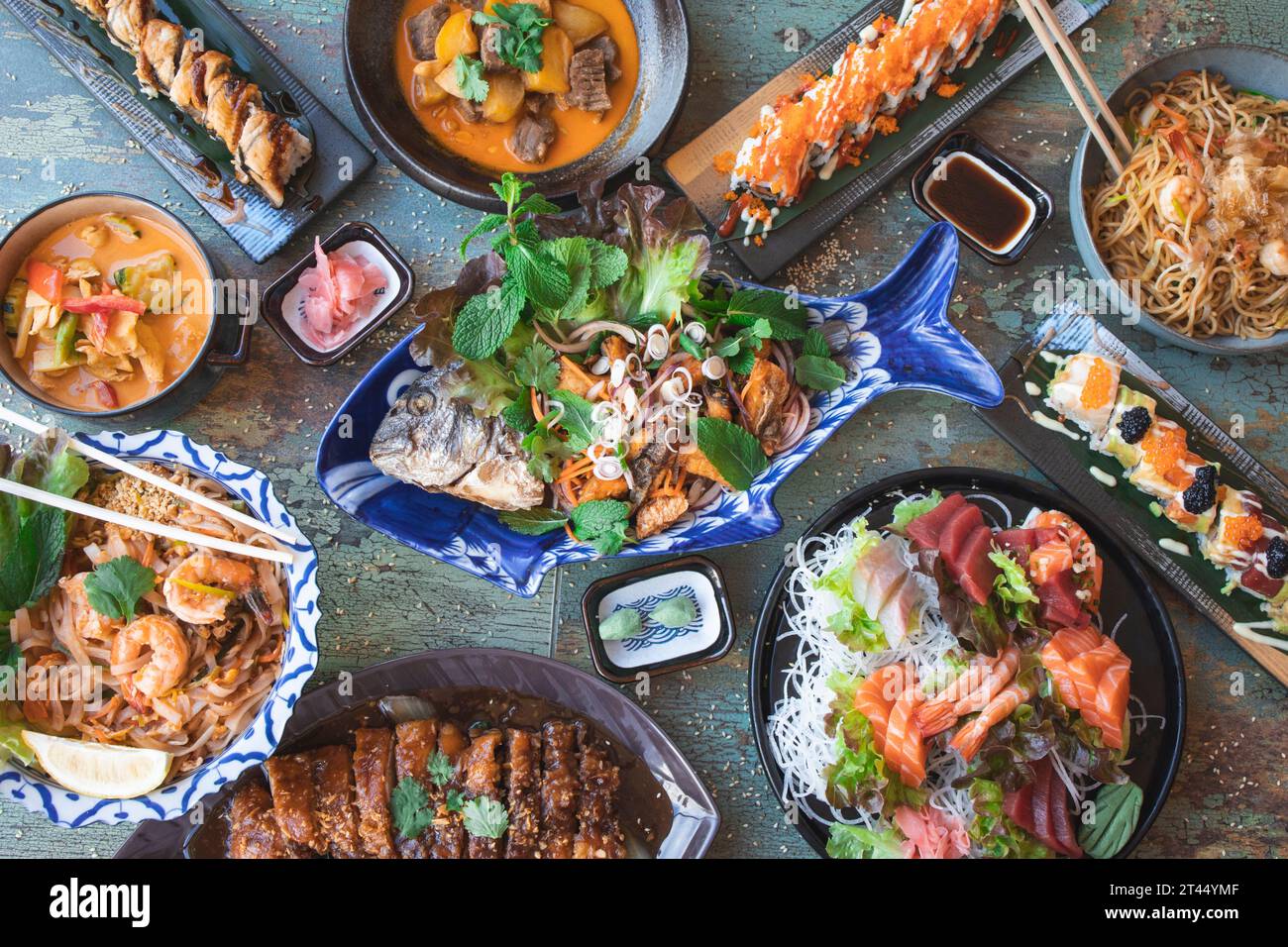 Varied Asian food. Famous Asian cuisine dishes on the table. Top view ...