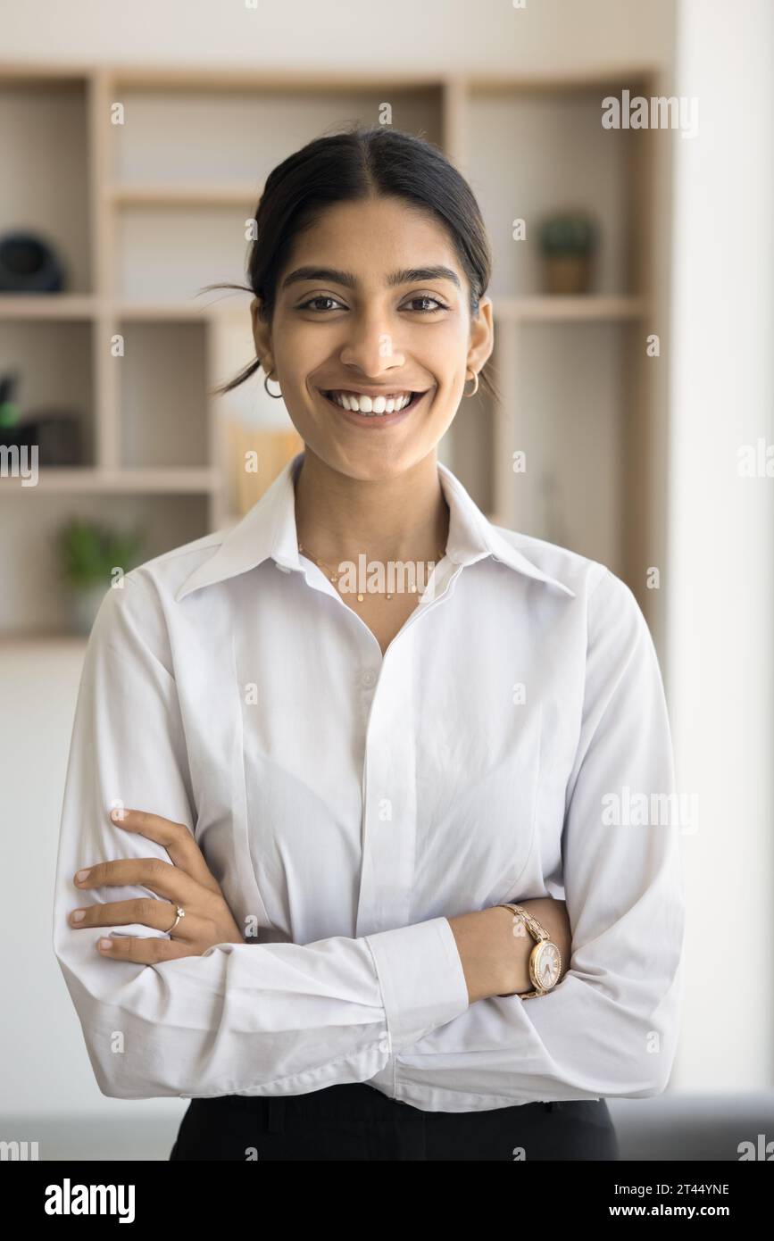 Happy young business professional girl vertical portrait Stock Photo - Alamy