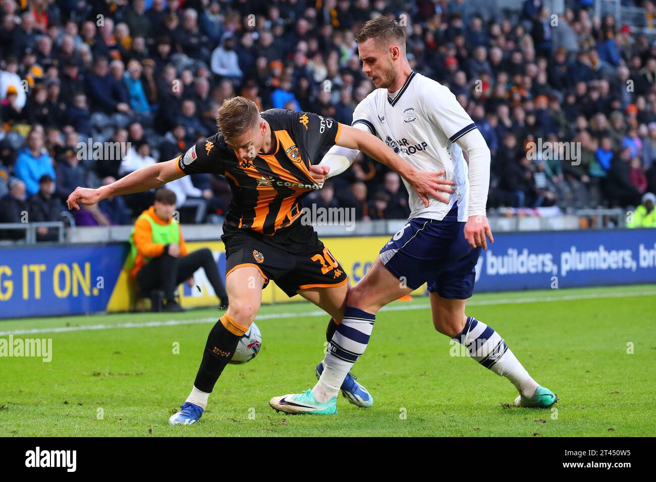 Liam Lindsay of Preston North End pulls at the shirt of Liam Delap of ...