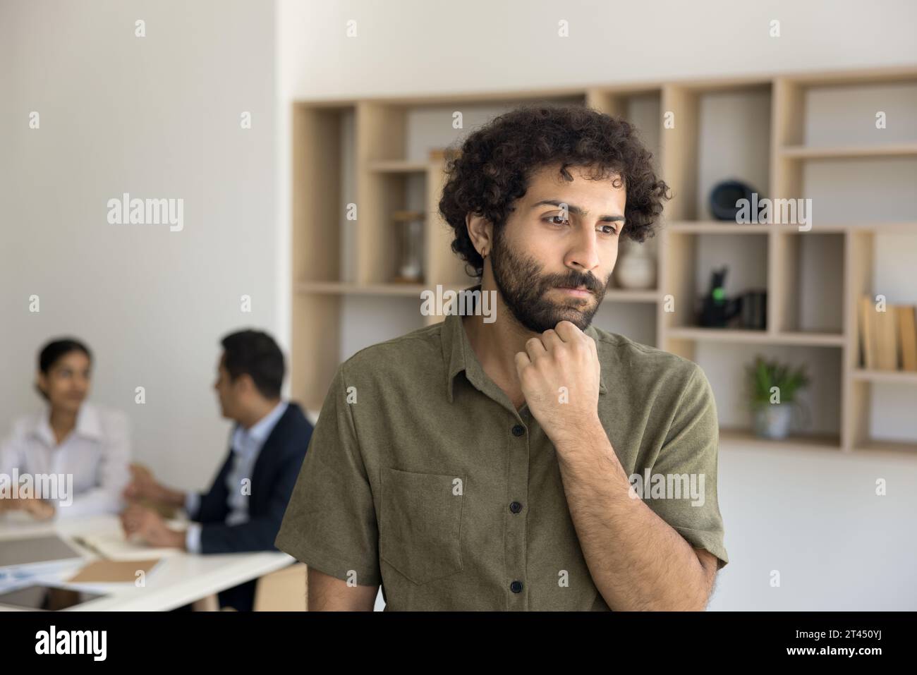Serious young Arab business man thinking in meeting room Stock Photo ...