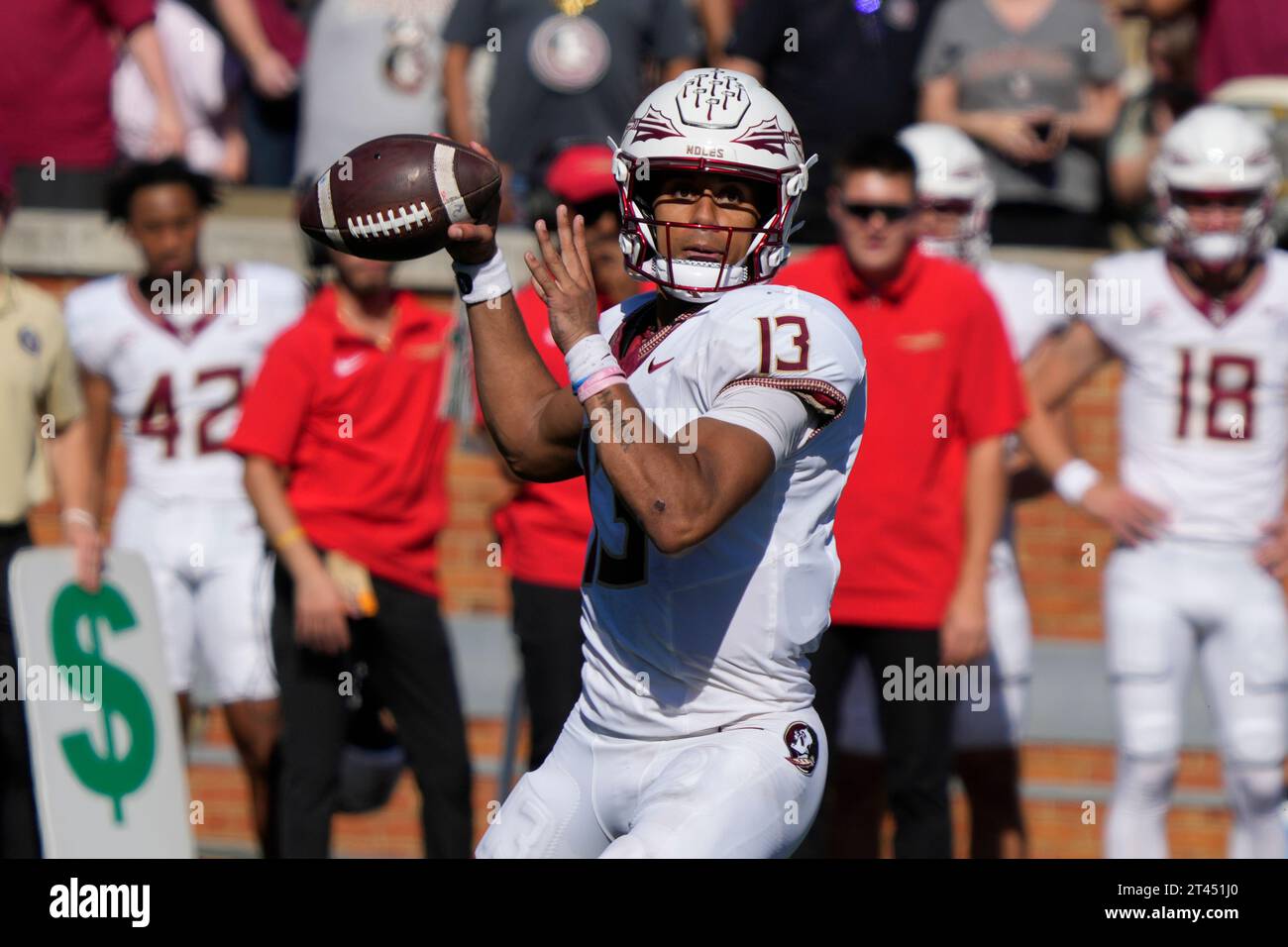 Florida State quarterback Jordan Travis (13) looks to pass against Wake ...