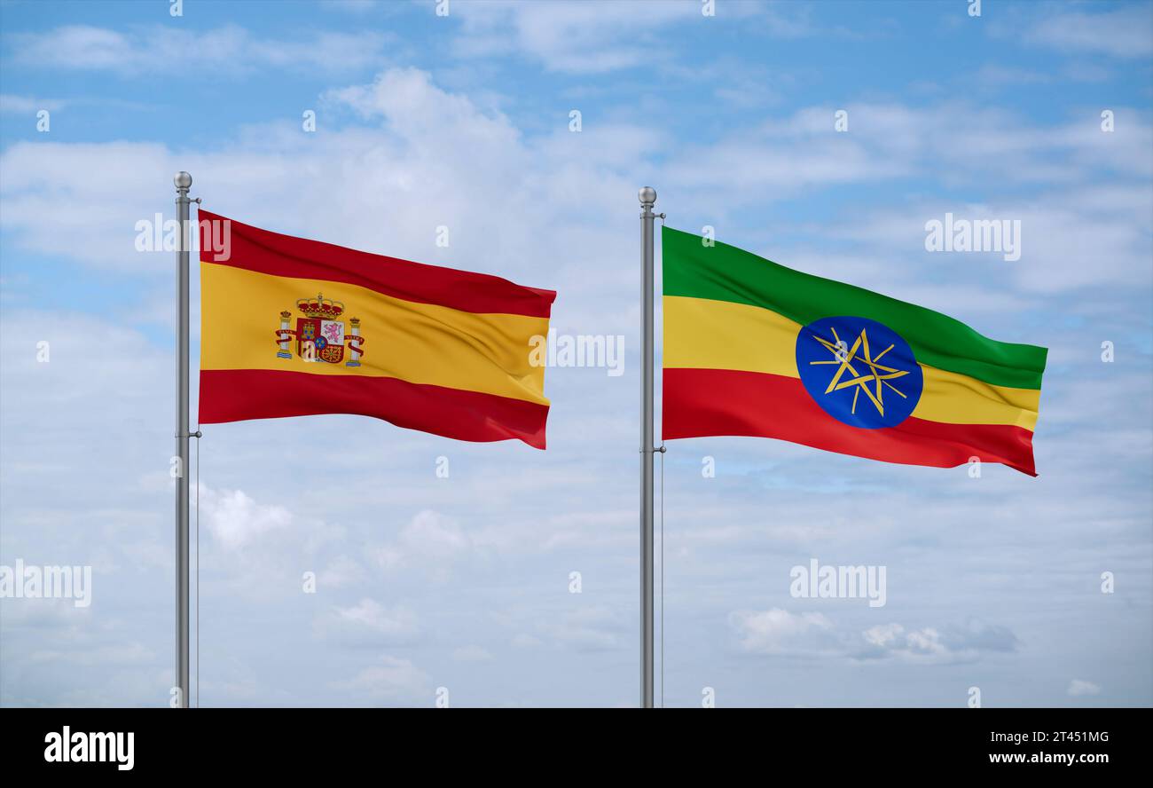 Ethiopia and Spain flags waving together on blue cloudy sky, two ...