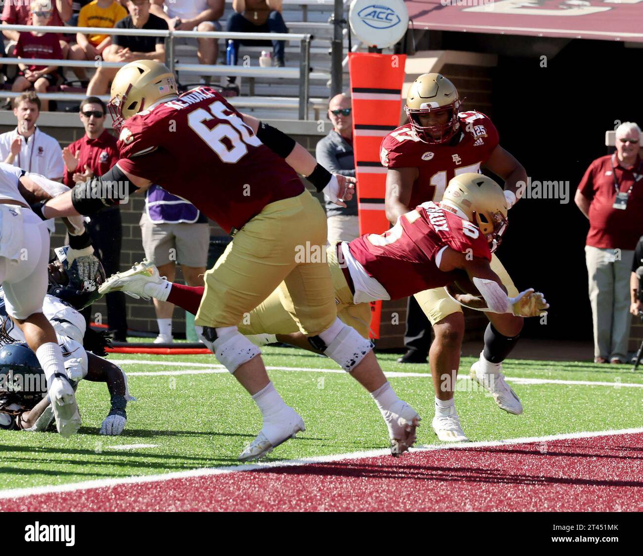 Boston College running back Kye Robichaux (5) lands the ball in the end ...