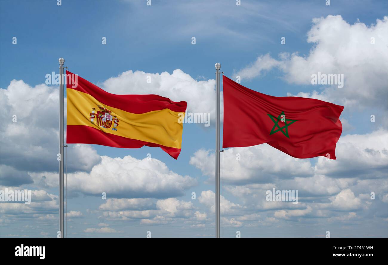 Morocco and Spain flags waving together on blue cloudy sky, two country ...