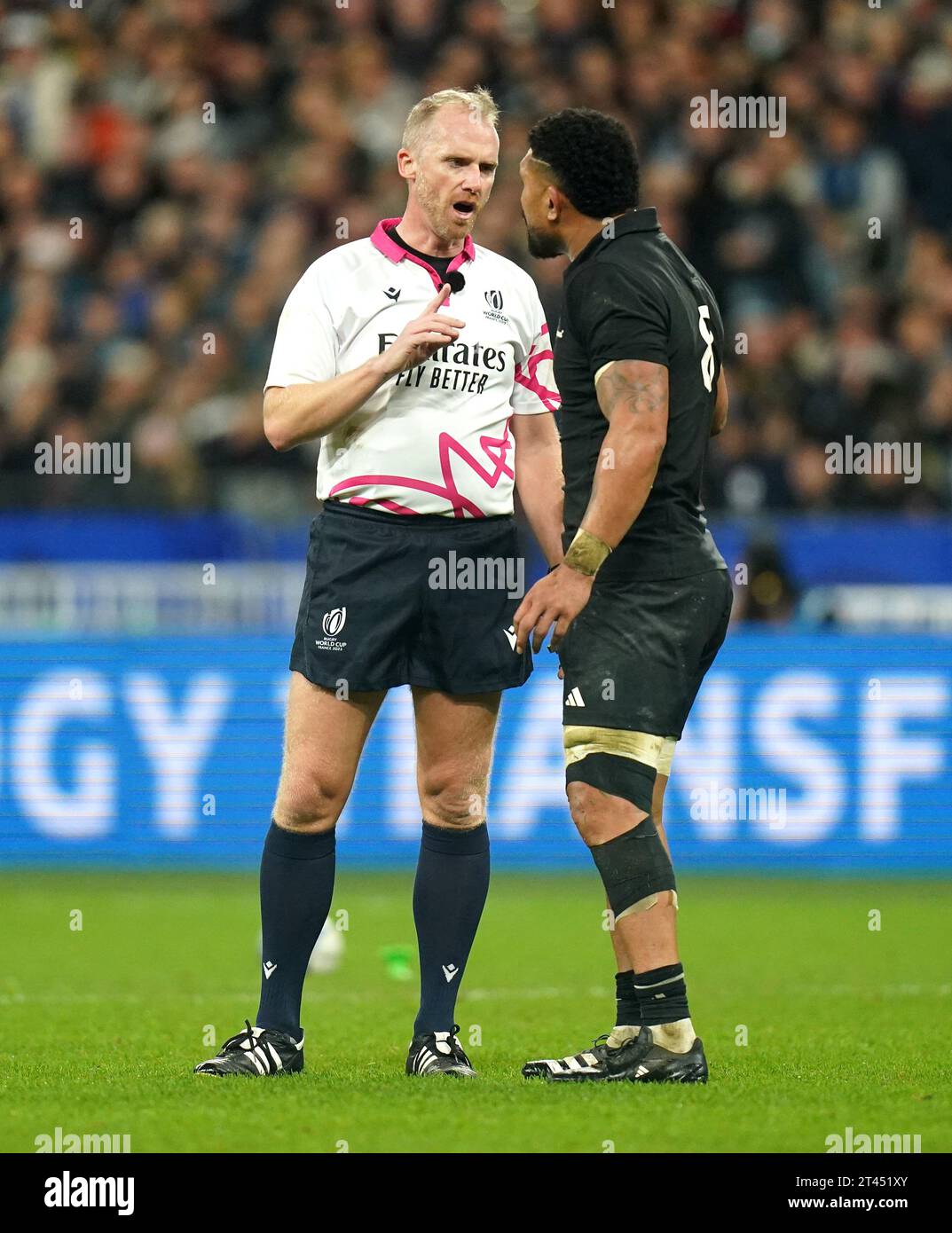 Referee Wayne Barnes speaks to New Zealand's Ardie Savea (right) during ...