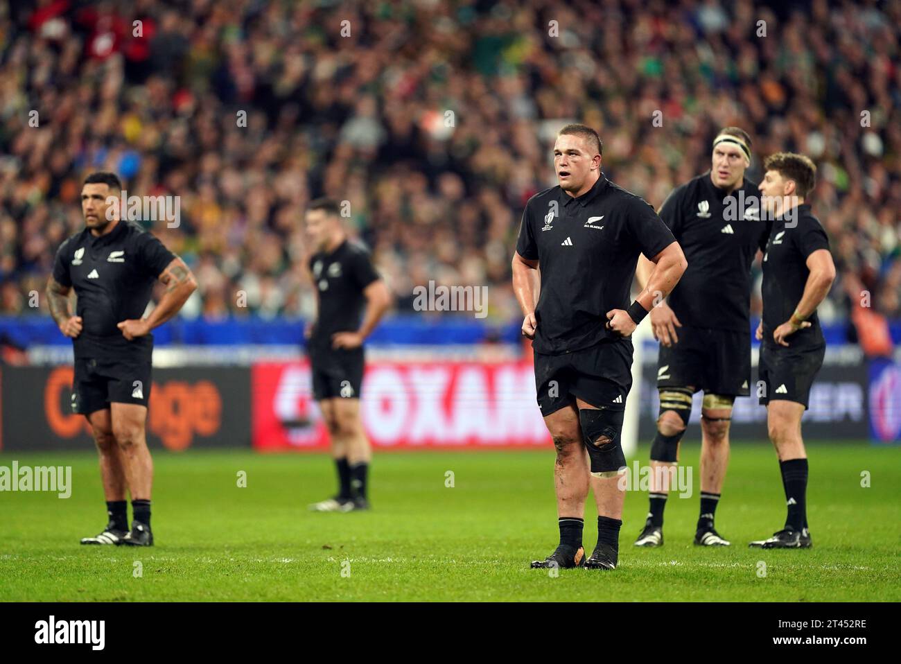 New Zealand's Ethan de Groot stands dejected after seeing his team mate ...