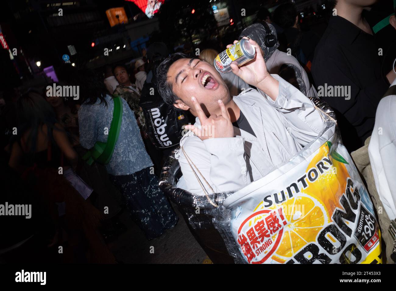 Tokyo, Japan. 28th Oct, 2023. A Halloween reveler dressed as a can of ...