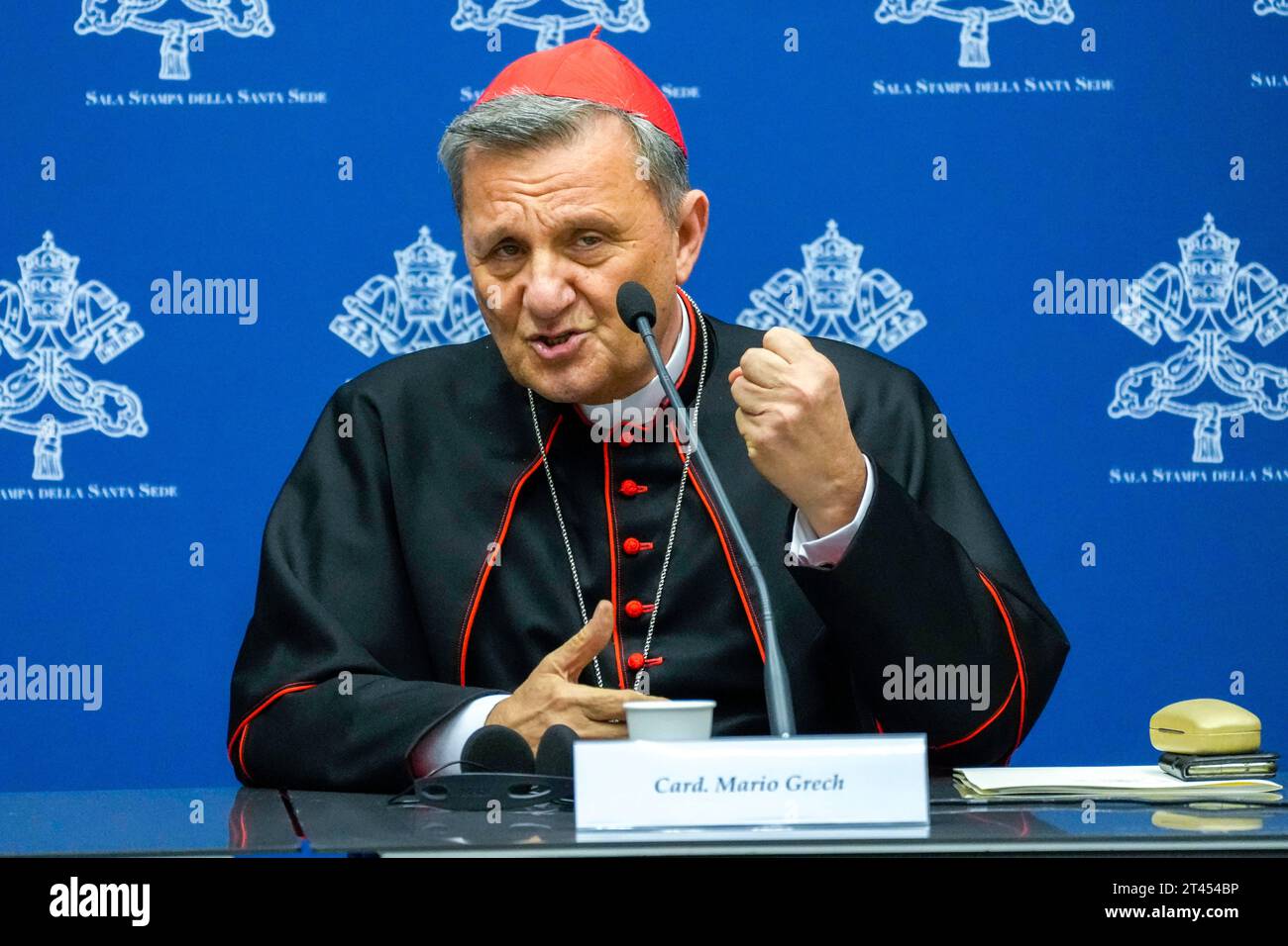 Cardinal Mario Grech talks to reporters during a press conference for ...