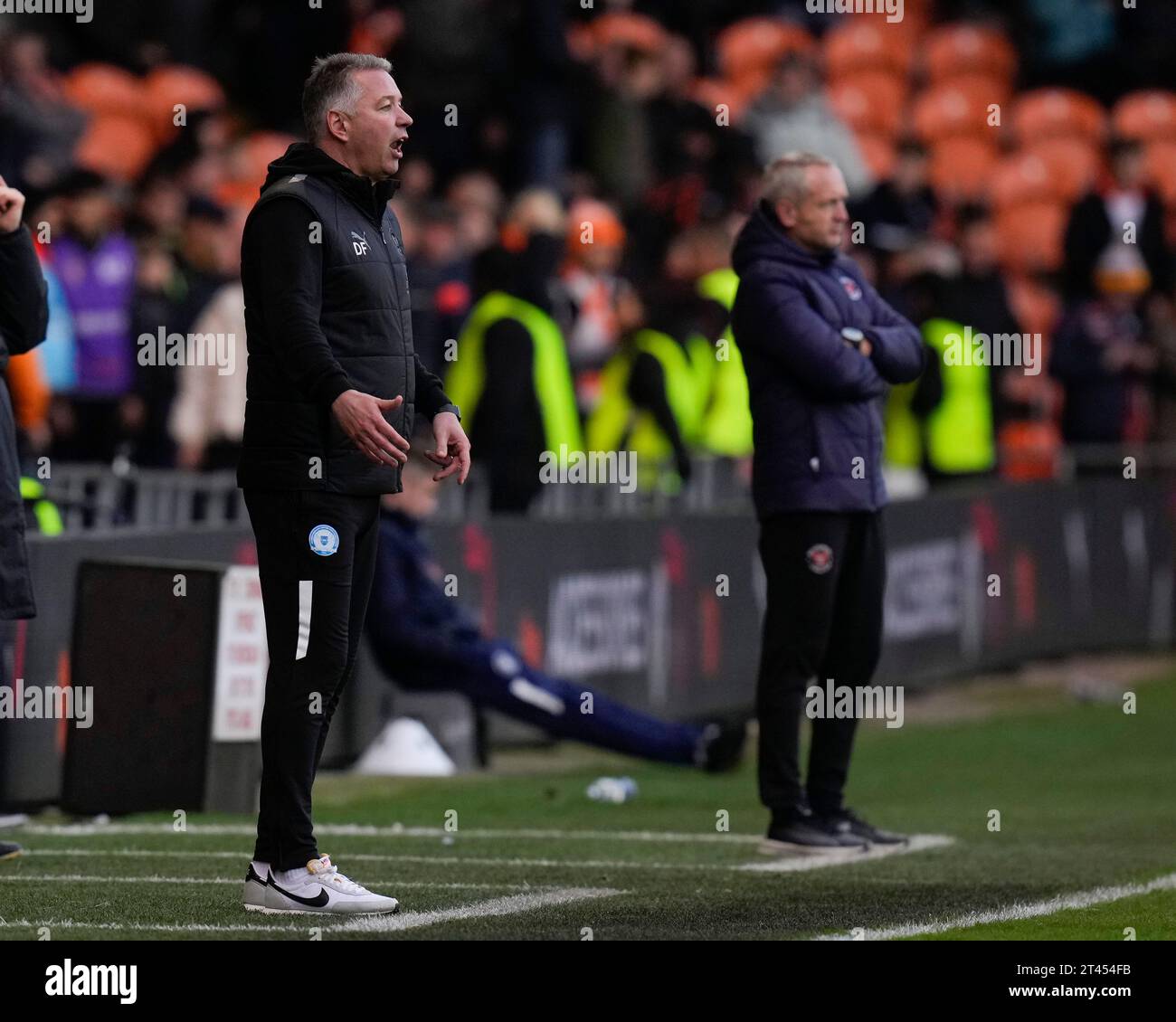 Darren Ferguson, manager of Peterborough United shouts instructions ...