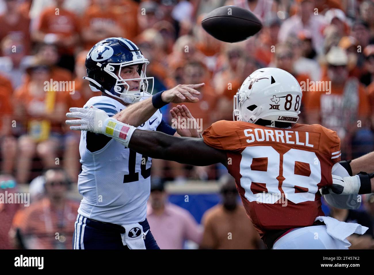 BYU quarterback Kedon Slovis (10) throws under pressure from Texas ...