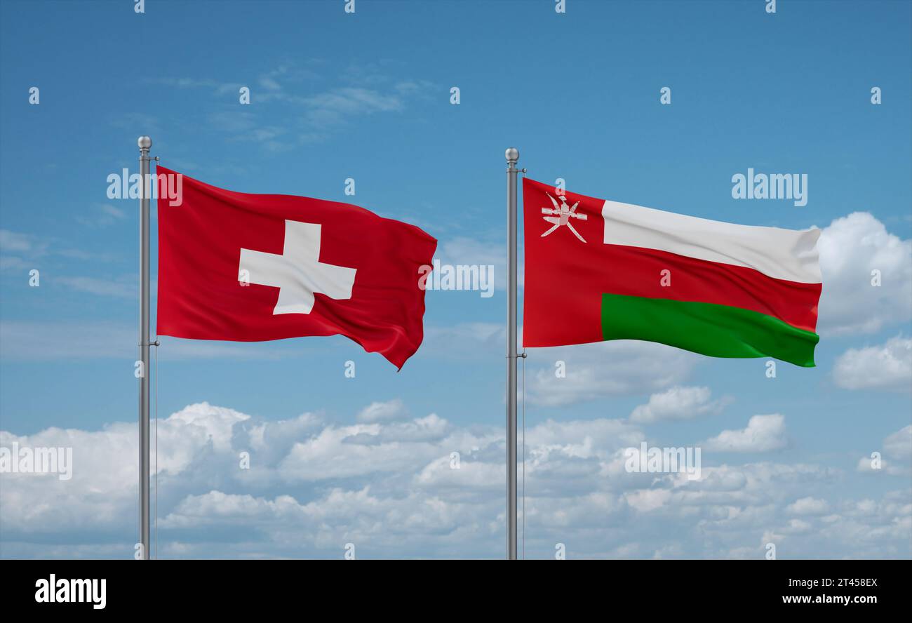 Oman and Switzerland flags waving together in the wind on blue cloudy ...