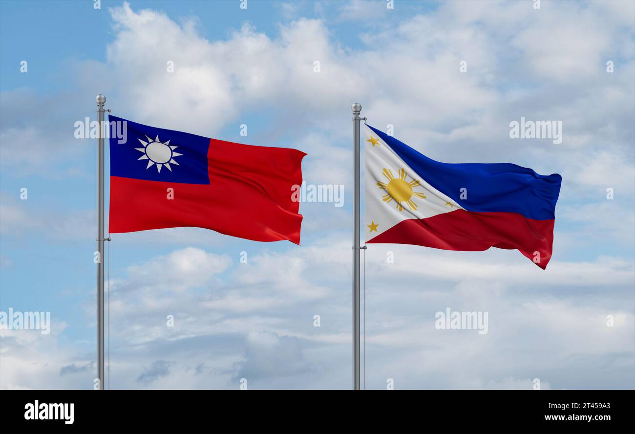 Philippines and Taiwan flags waving together in the wind on blue cloudy ...