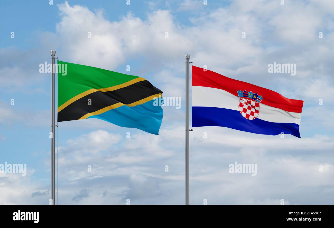 Croatia and Tanzania flags waving together in the wind on blue cloudy ...