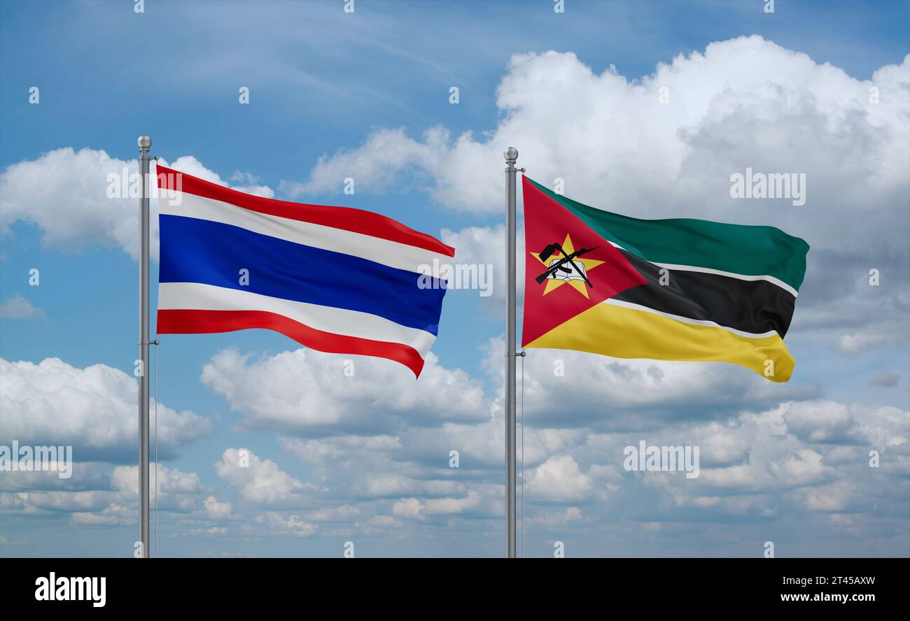 Mozambique and Thailand flags waving together in the wind on blue cloudy sky, two country ...
