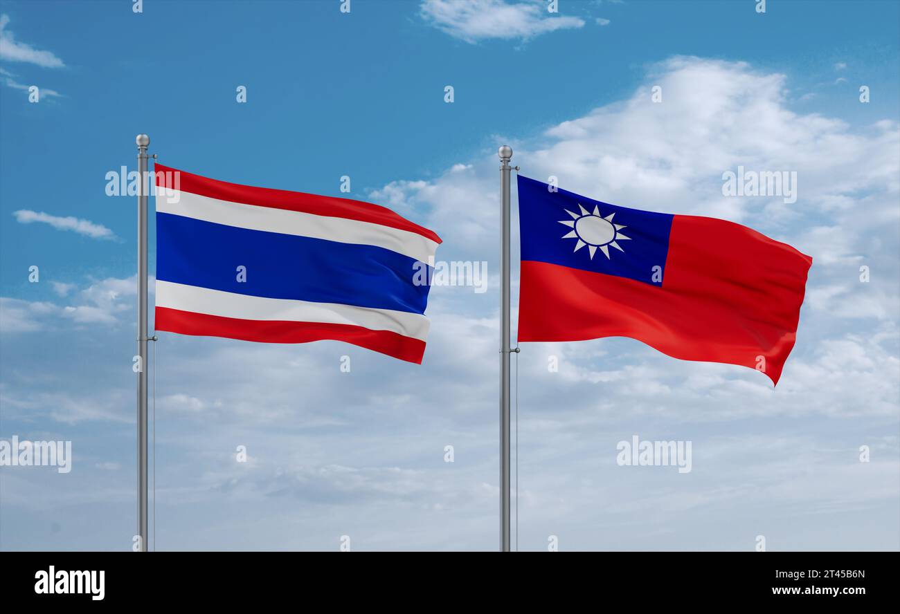 Taiwan and Thailand flags waving together in the wind on blue cloudy ...
