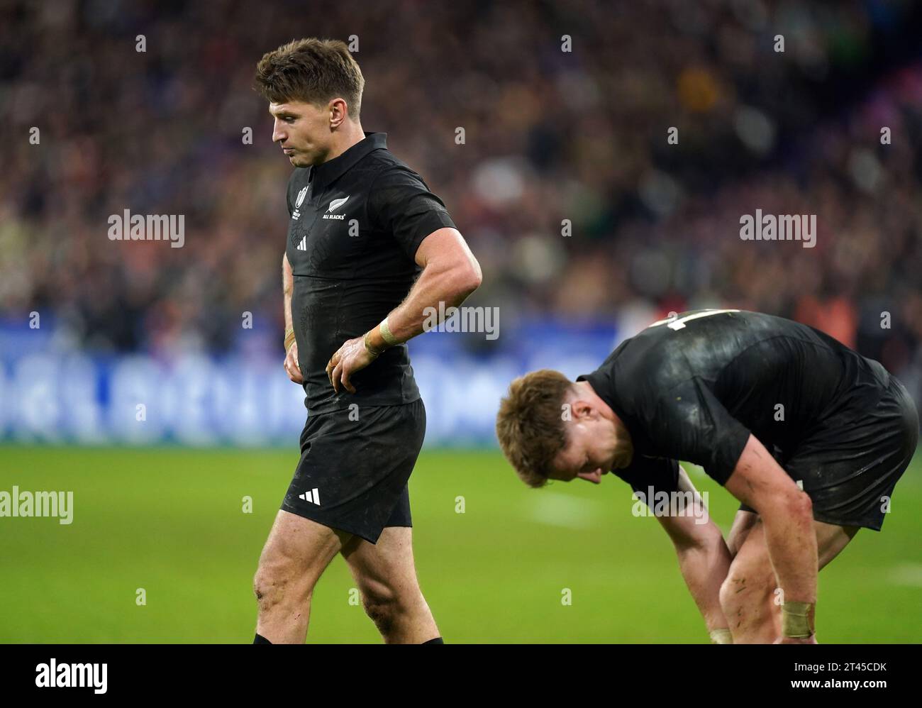 New Zealand's Beauden Barrett (left) and Jordie Barrett look dejected ...