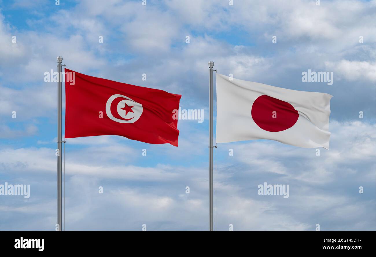 Japan and Tunisia flags waving together on blue cloudy sky, two country ...