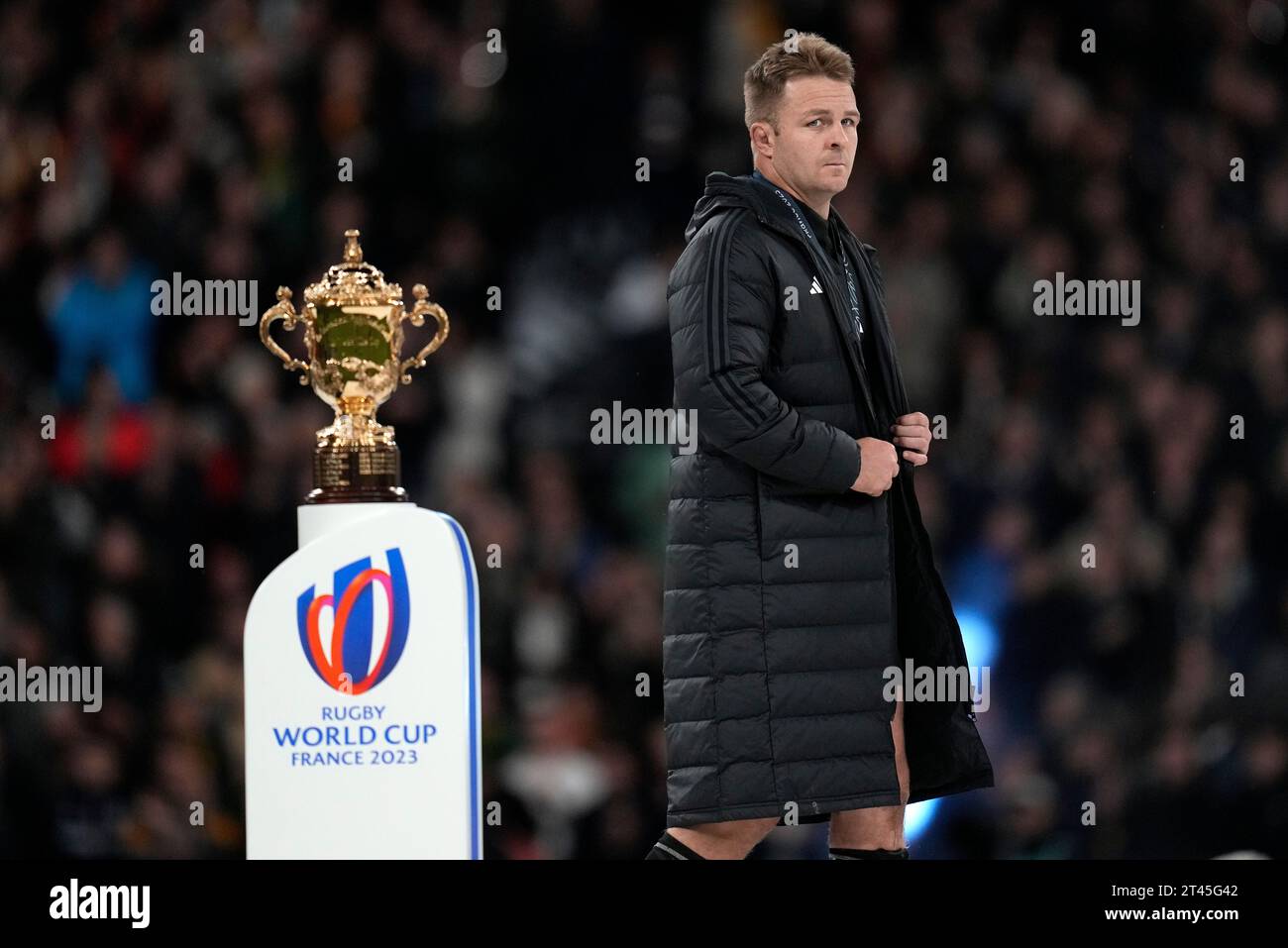New Zealand's Sam Cane walks past the trophy during presentation ...