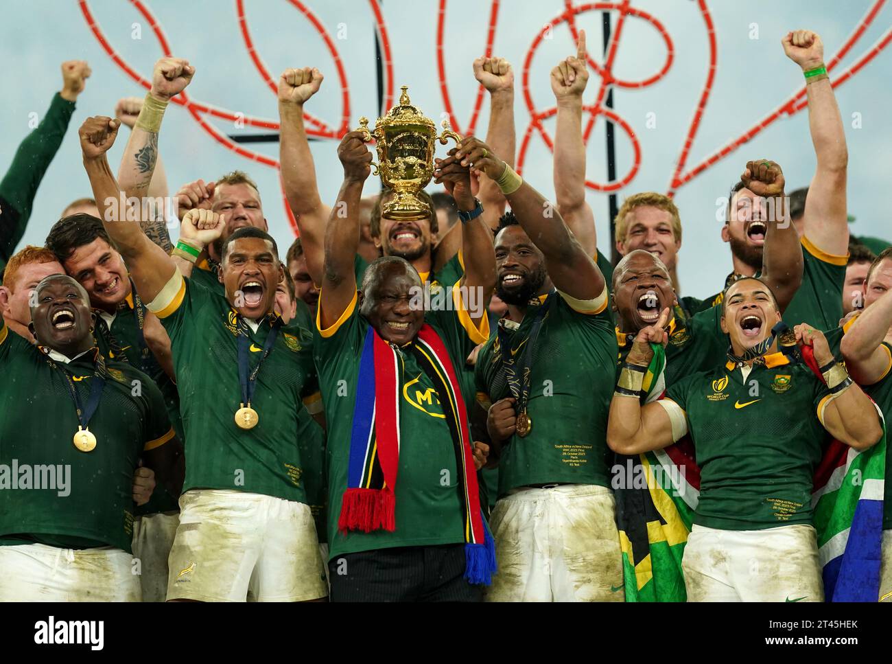 South African President Cyril Ramaphosa lifts the Webb Ellis Cup with ...