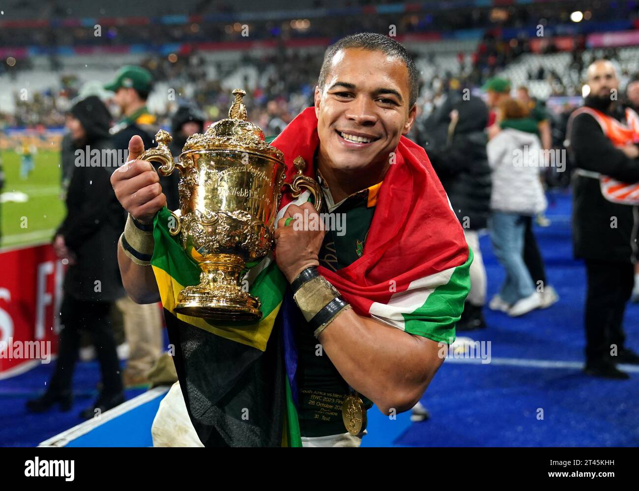 South Africa's Cheslin Kolbe celebrates with the Webb Ellis Cup ...